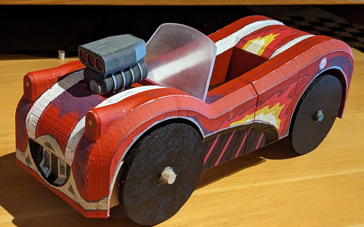 3D design SpeedyBolide (Rubber band powered toy car) - Tinkercad